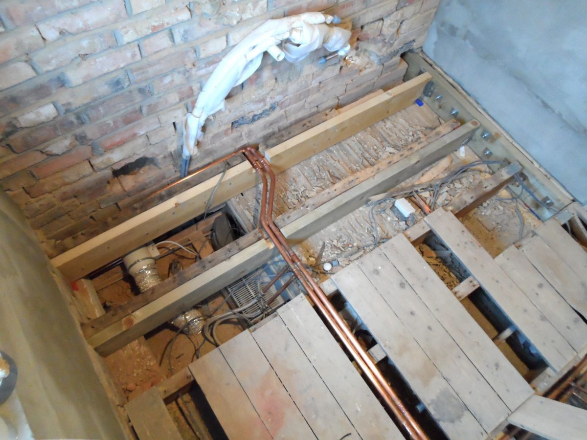 bathroom-radiator-pipes-reconnected